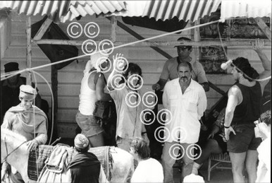 34866848-Actor Sylvester Stallone surrounded by his bodyguards on the ...