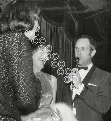 34914881-Actor Ian Hendry right and wife, seen talking to DJ Stuart ...