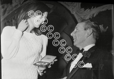 34915015-Actress Diana Rigg receives her award from Weekend editor ...