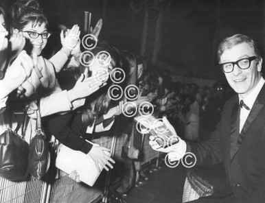34915017-Actor Michael Caine with his award for Top Film Actor, at the ...