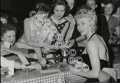 34915378-Actress Vera Day signing autograph at Weekend Mail dance ...