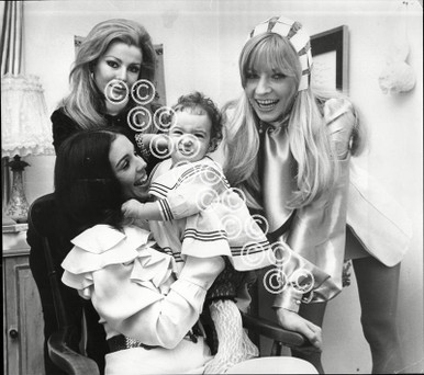 35585146-Actress, Viviane Ventura, holding her baby daughter Jasmine on ...