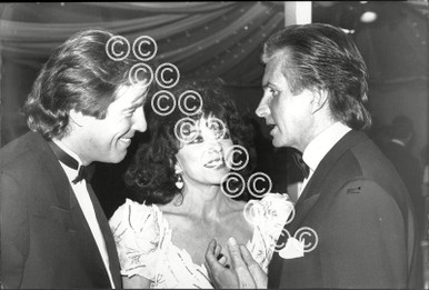 35585351-L-R Bill Wiggins, actress, Joan Collins and actor George ...