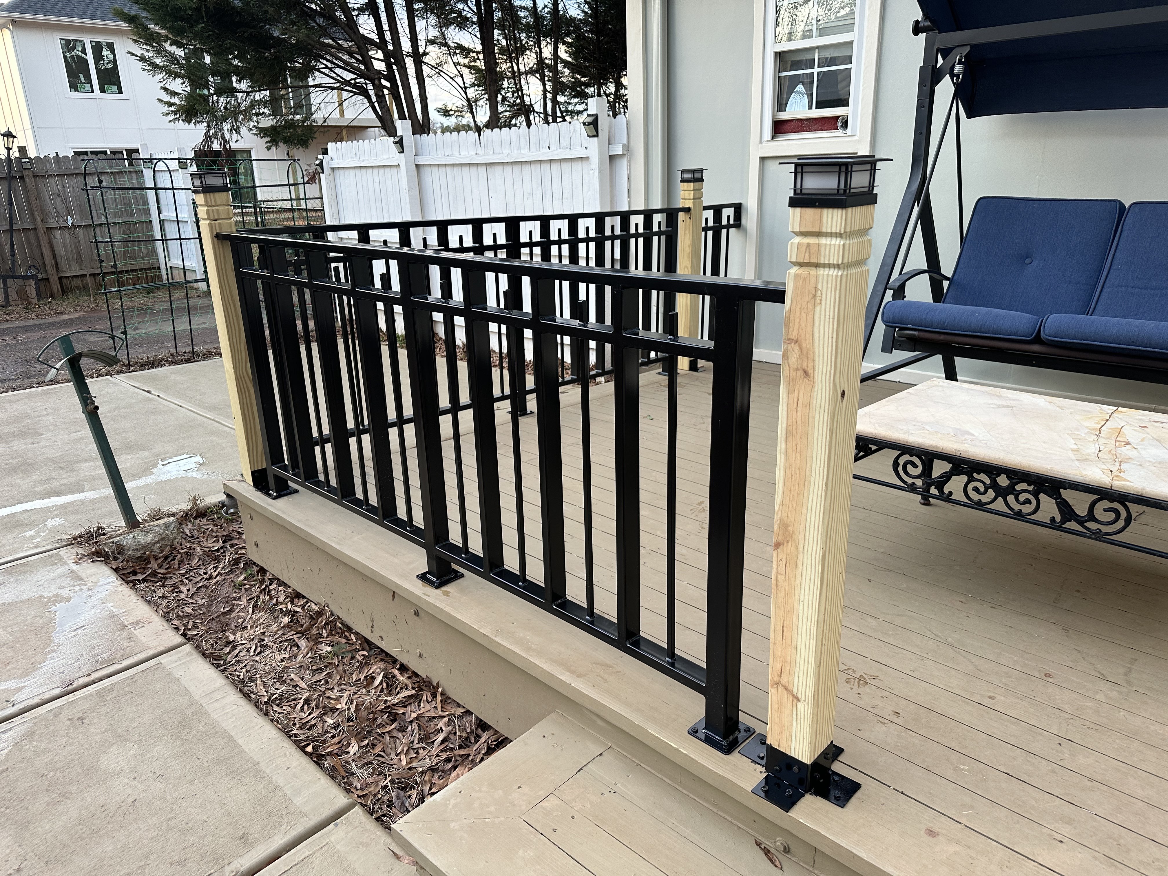 Enhance Your Outdoor Oasis with Iron Railing and Wooden Posts ...
