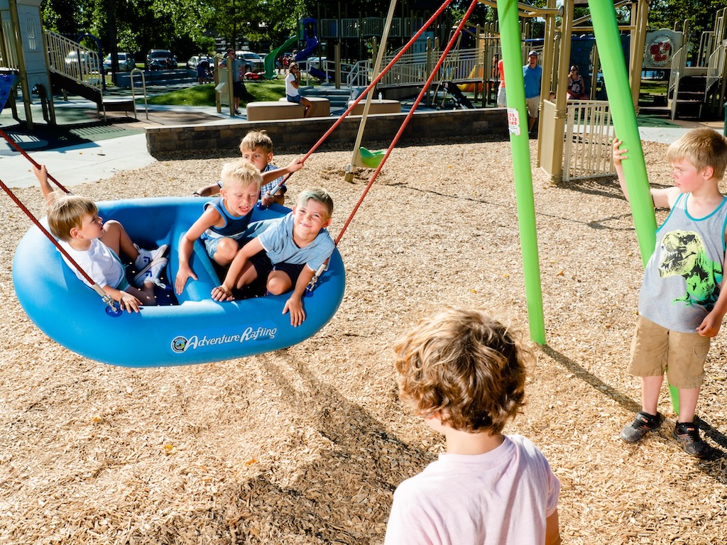 The Benefits of Group Swings - Recreation Plus