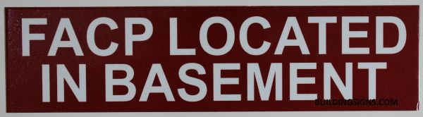 FACP LOCATED IN BASEMENT SIGN RED