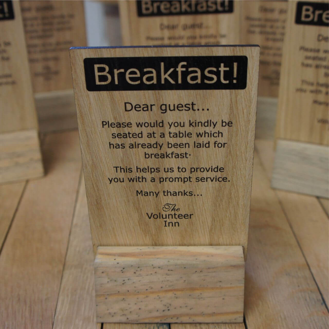 Cam Graphic: engraved wooden self standing sign