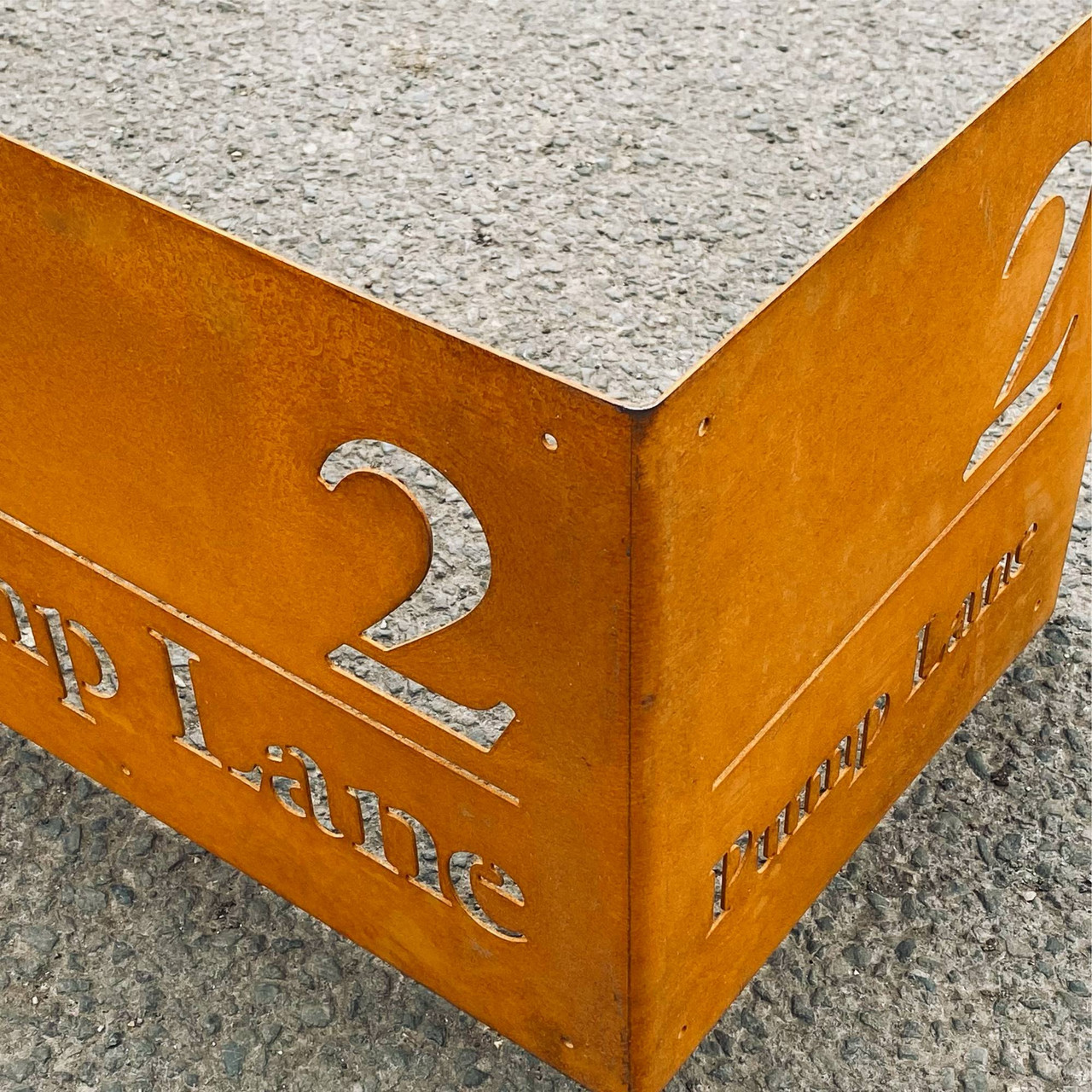 Folded Corten steel business signs ideal for building or street corners