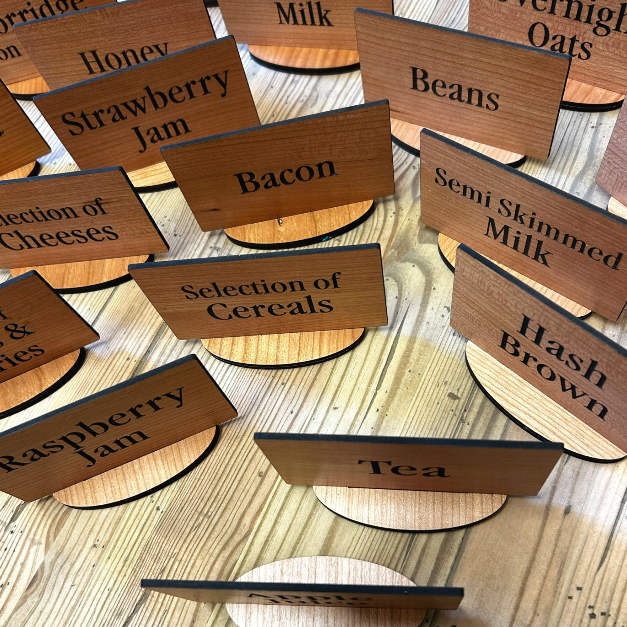 Cam Graphic: engraved wooden self standing sign