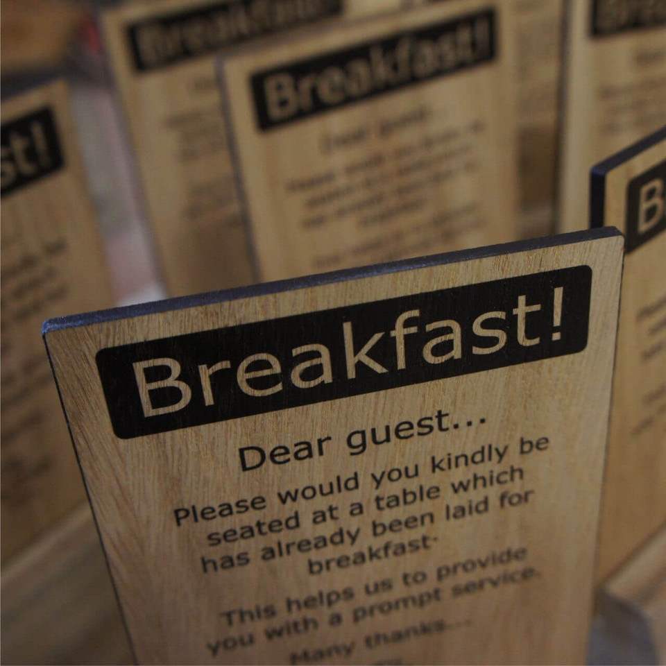 Cam Graphic: engraved wooden self standing sign