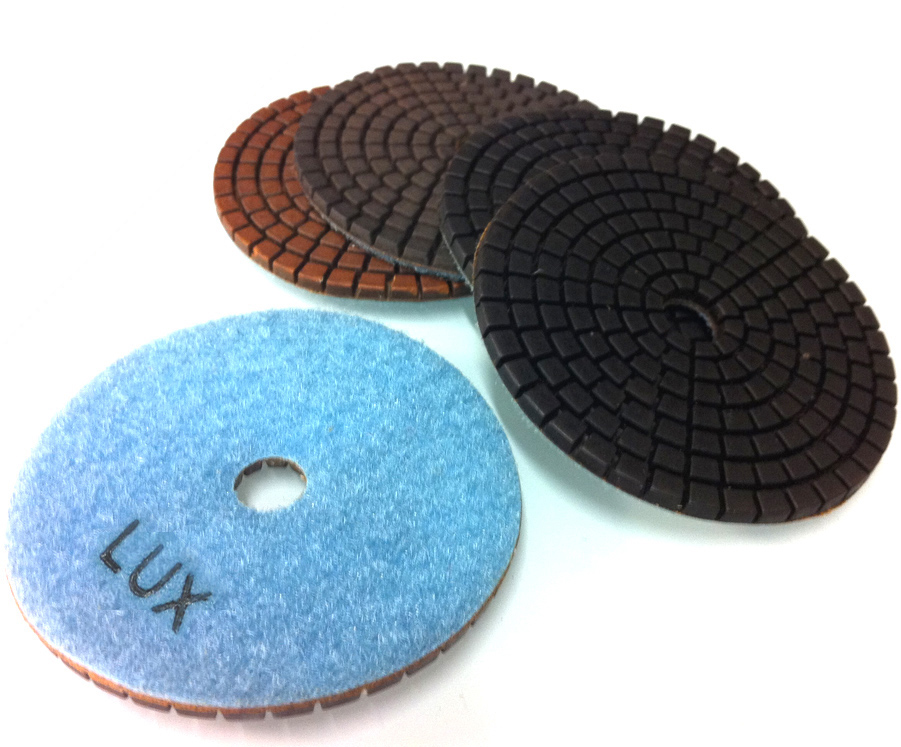 D-Lux resin polishing pads.