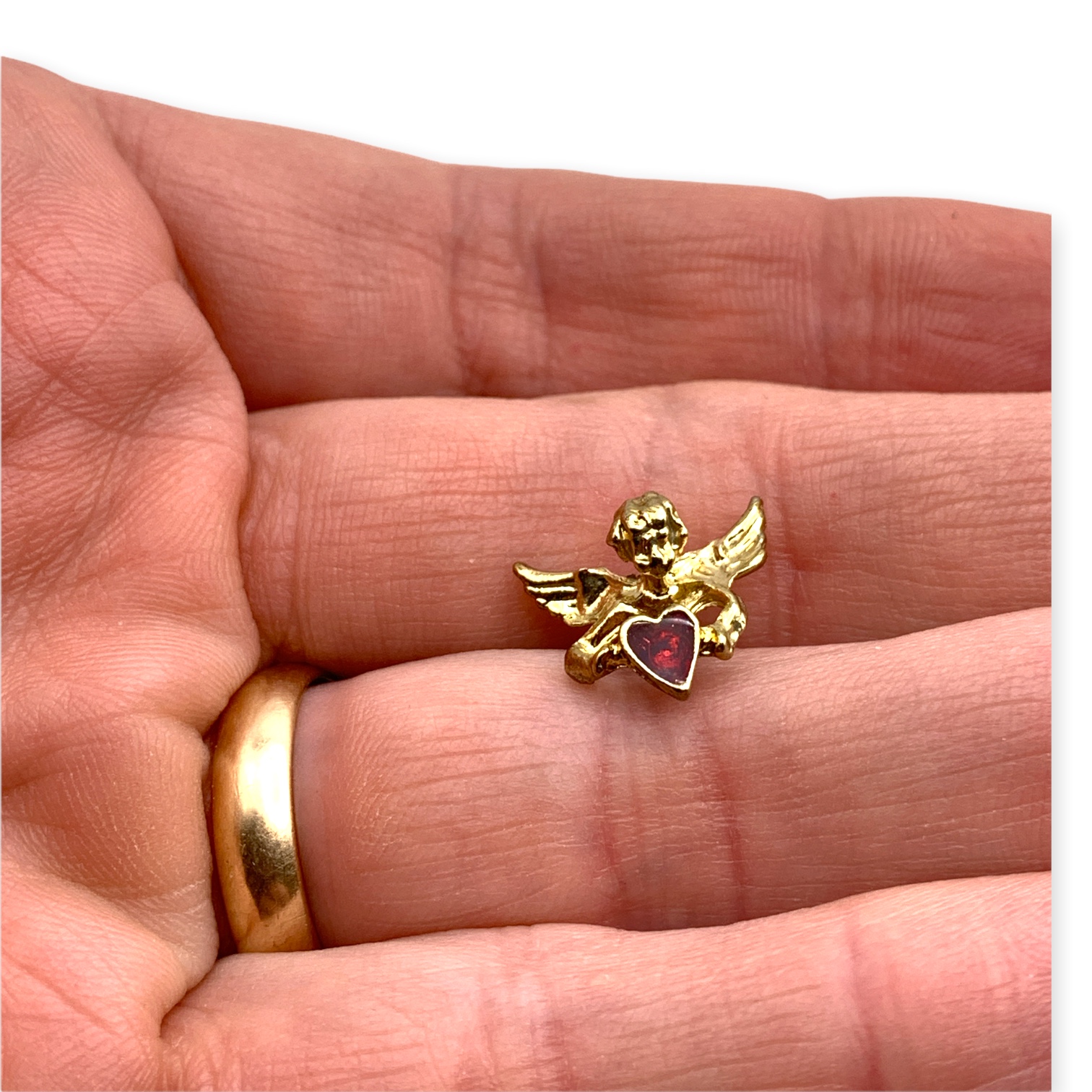 Angel holding red heart lapel pin | StockPins.com