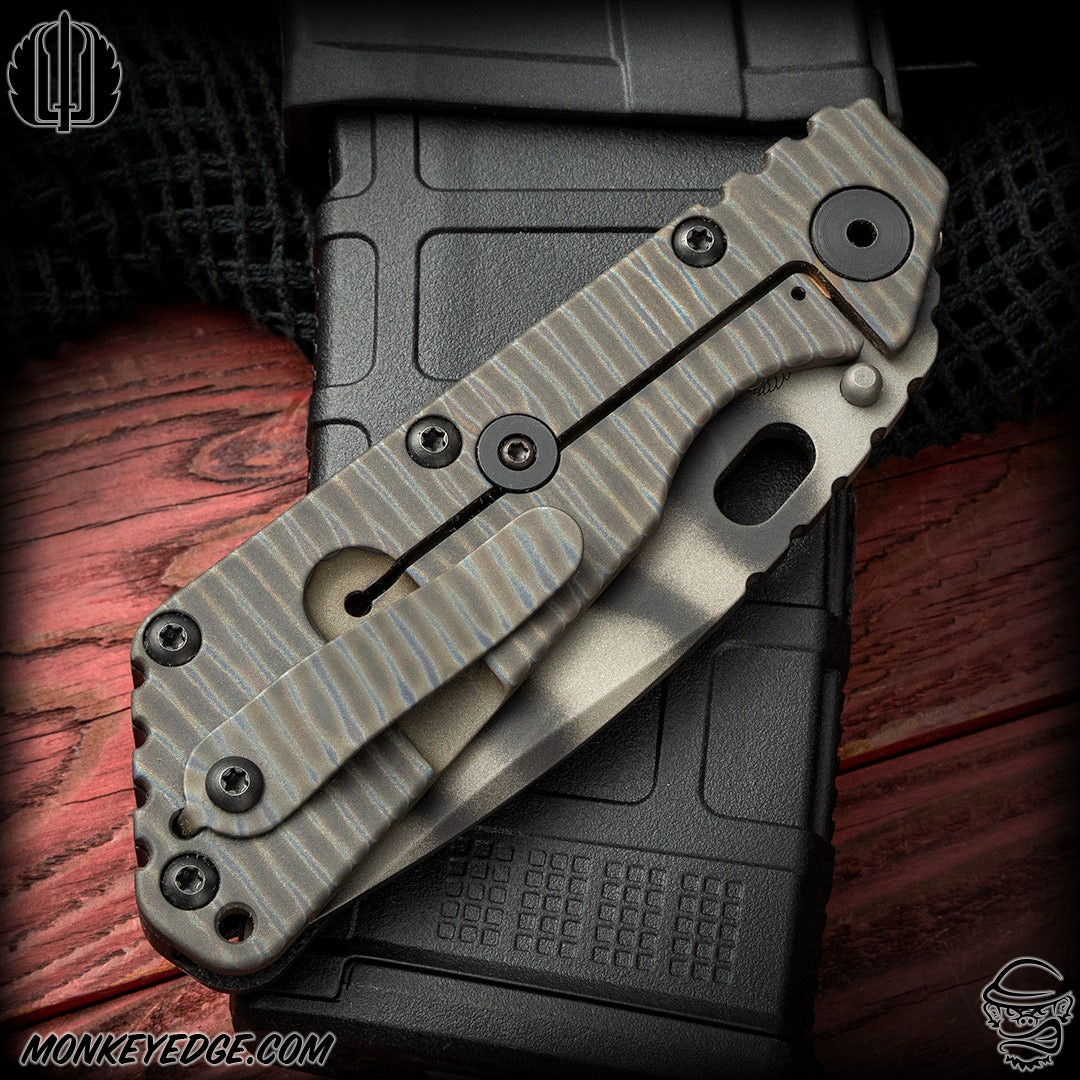 Monkey Edge - Strider Knives Folder: SMF Dagger Grind - Striped/Flamed