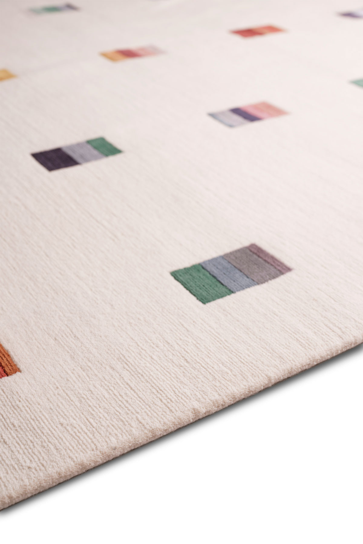 Spectra Ivory Tibetan Wool Cut Pile rug by Paul Smith