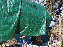 How to Cover and Protect Your Boat with a Tarp - Canopies and Tarps
