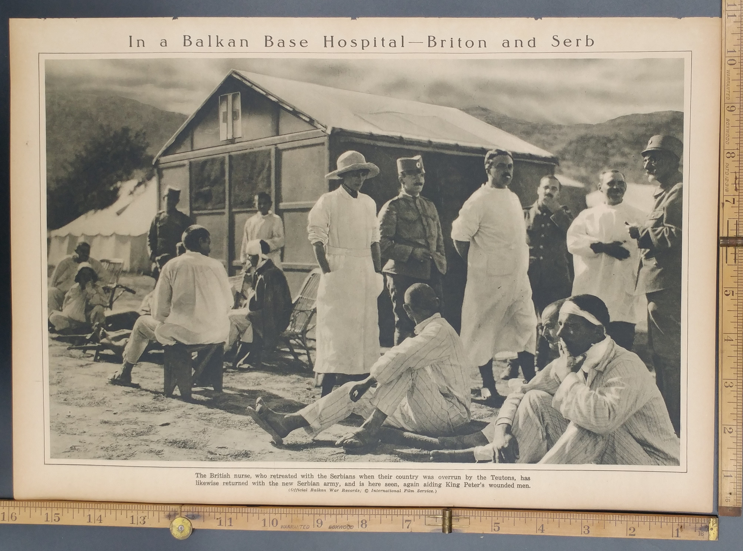 In a Balkan base hospital, Britain and Serb.A nurse mending King Peters ...