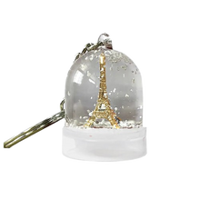 Les Parisettes Eiffel Tower Snow Globe Key Ring (Gold) | Simply Gourmand