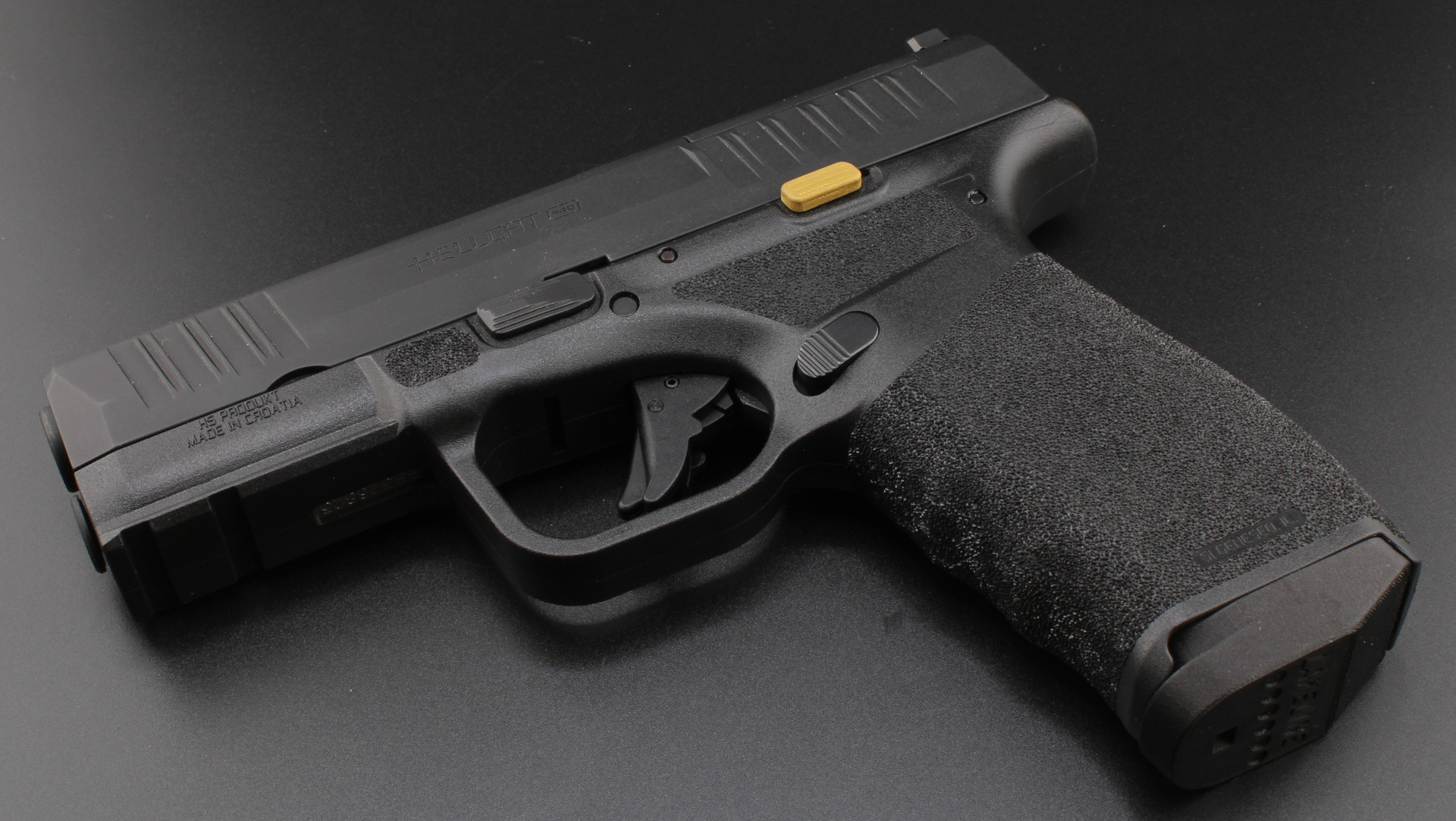 Extended Stainless Slide Release for the Springfield Hellcat Gold finish