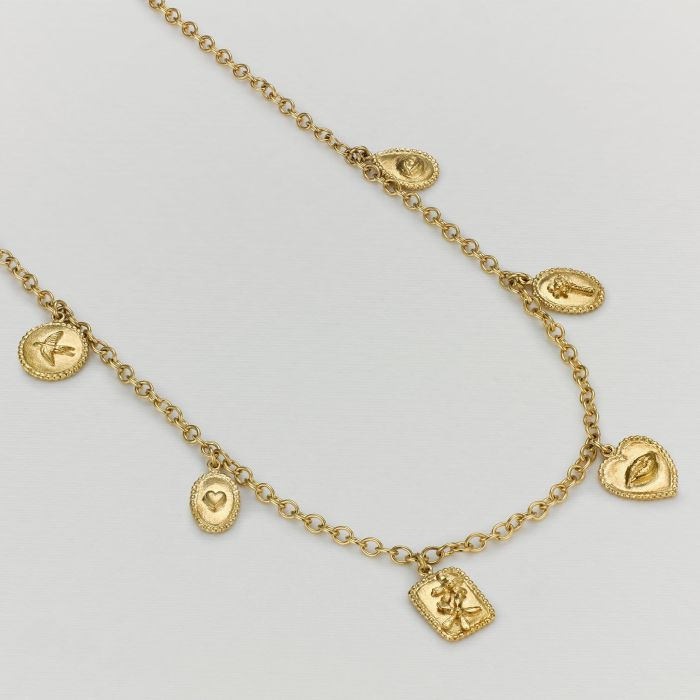 Short gold necklace with charm store