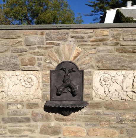 Dolphins with twisted tails Wall Fountain - Kenneth Lynch and Sons