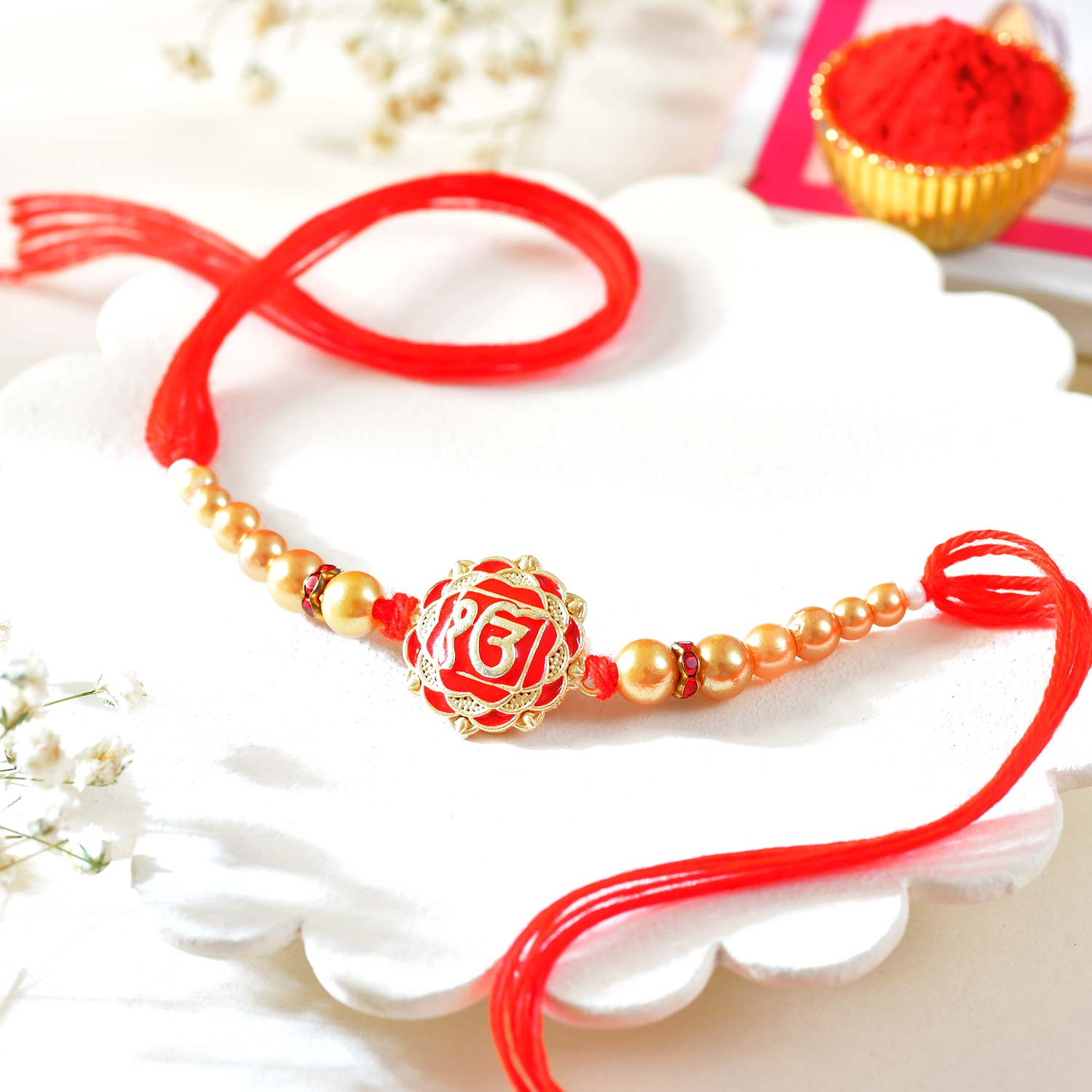 Send Pious Ik Onkar & Khanda Sahib Rakhi Online To Australia | Rakhi.com