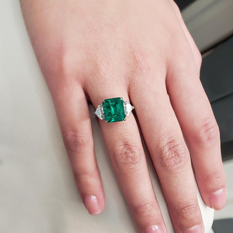 Emerald Step Cut with Hearts Three Stone Engagement Ring
