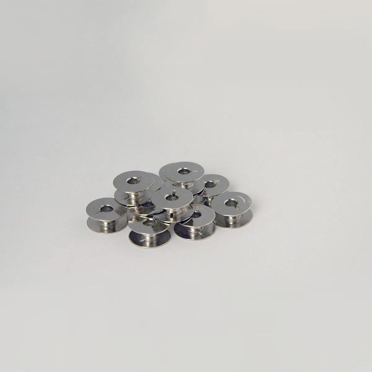 Baby Lock Type L Metal Bobbins (12 Pack)