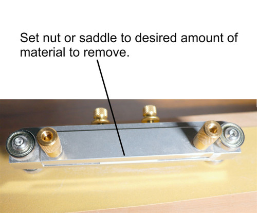 Precision adjustable sander for nut and saddles. Sander allows accurate ...