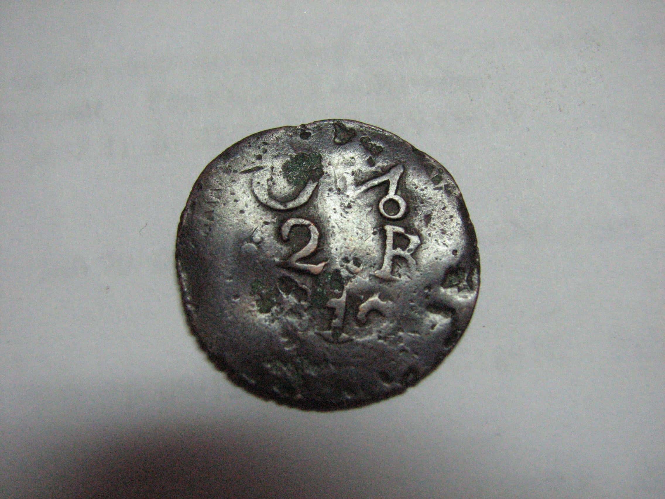 Mystery coin. - Kellyco Metal Detectors