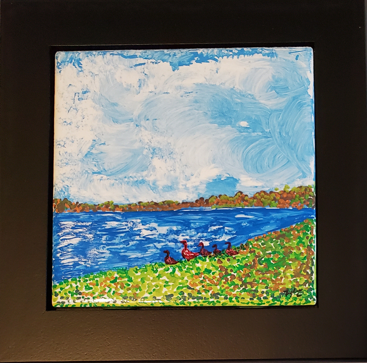 Painted ceramic tile featured ducks on a lake framed