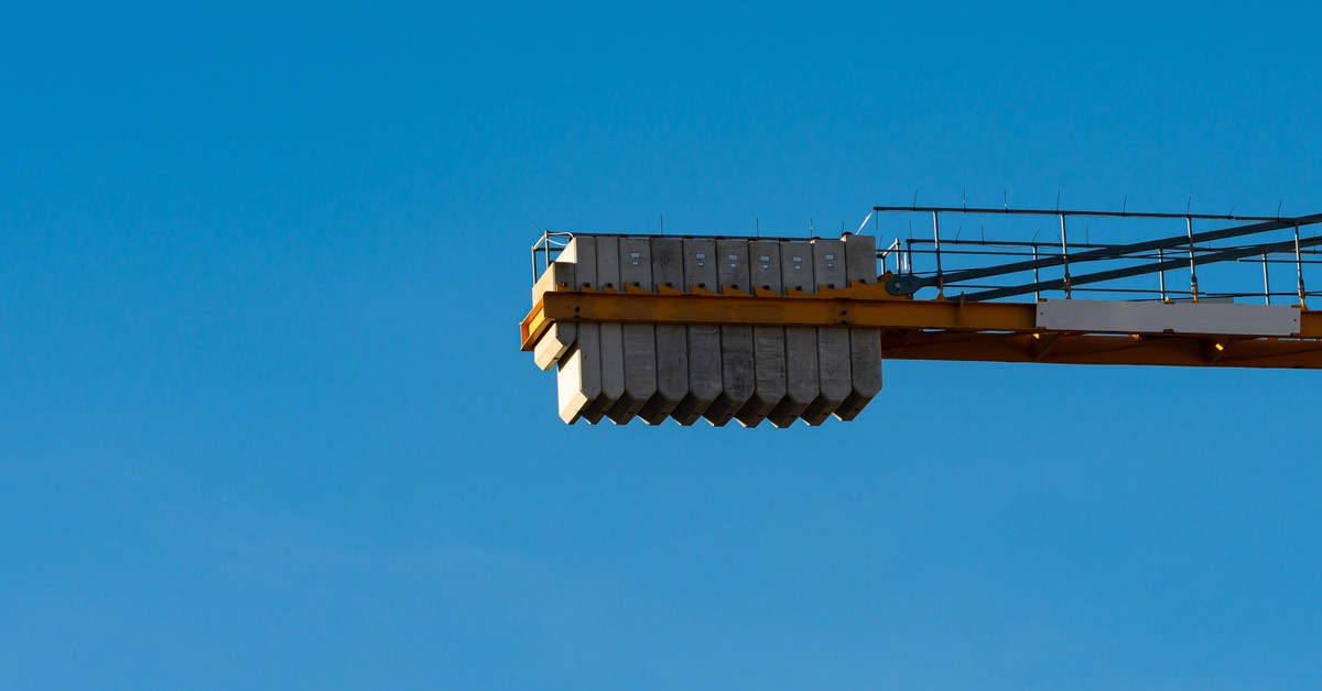 The Role of Counterweights in Excavators and Cranes - Tractor Zone ...