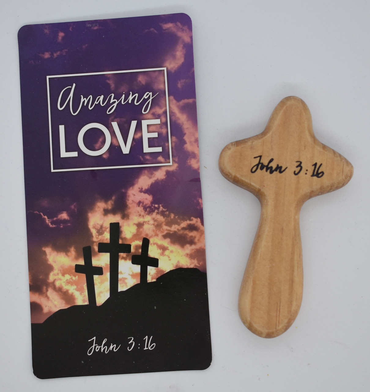 Get comfort from this wood cross that fits nicely in the palm of your hand.