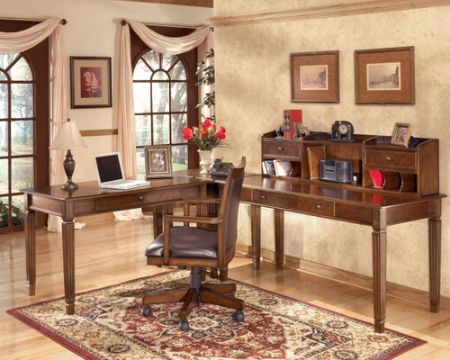 The Hamlyn Medium Brown Home Office Small Leg Desk is available at Discount Furniture Center proudly serving South Hill and Farmville VA and surrounding areas