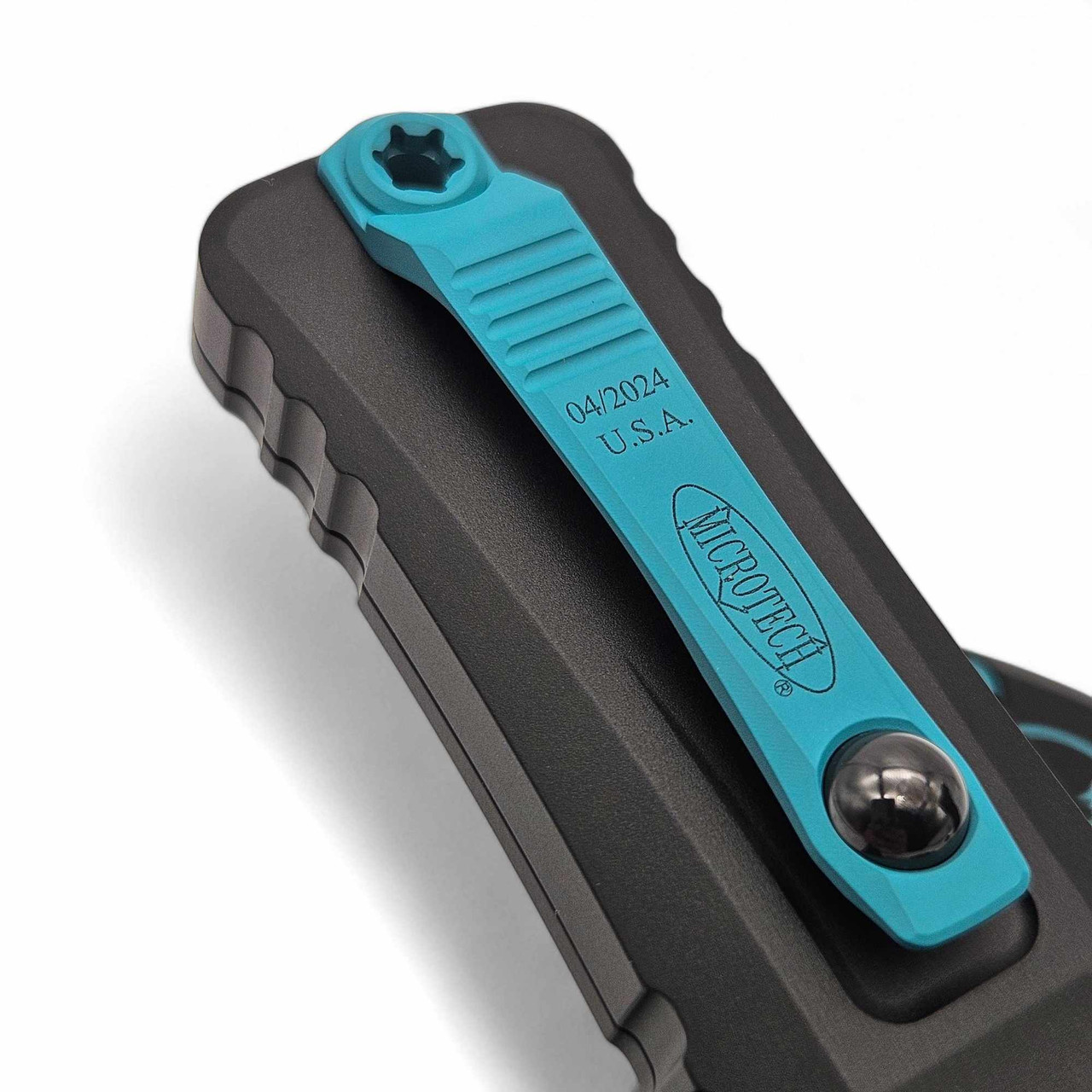 Microtech Combat Troodon Generation III 1142-3TQSK Double Edge Full Serated Turquoise Standard