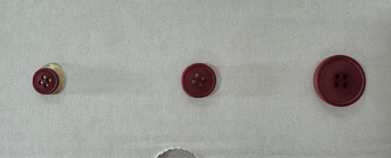Wine Button (three sizes, $1, $2, $3) - Fishman's Fabrics