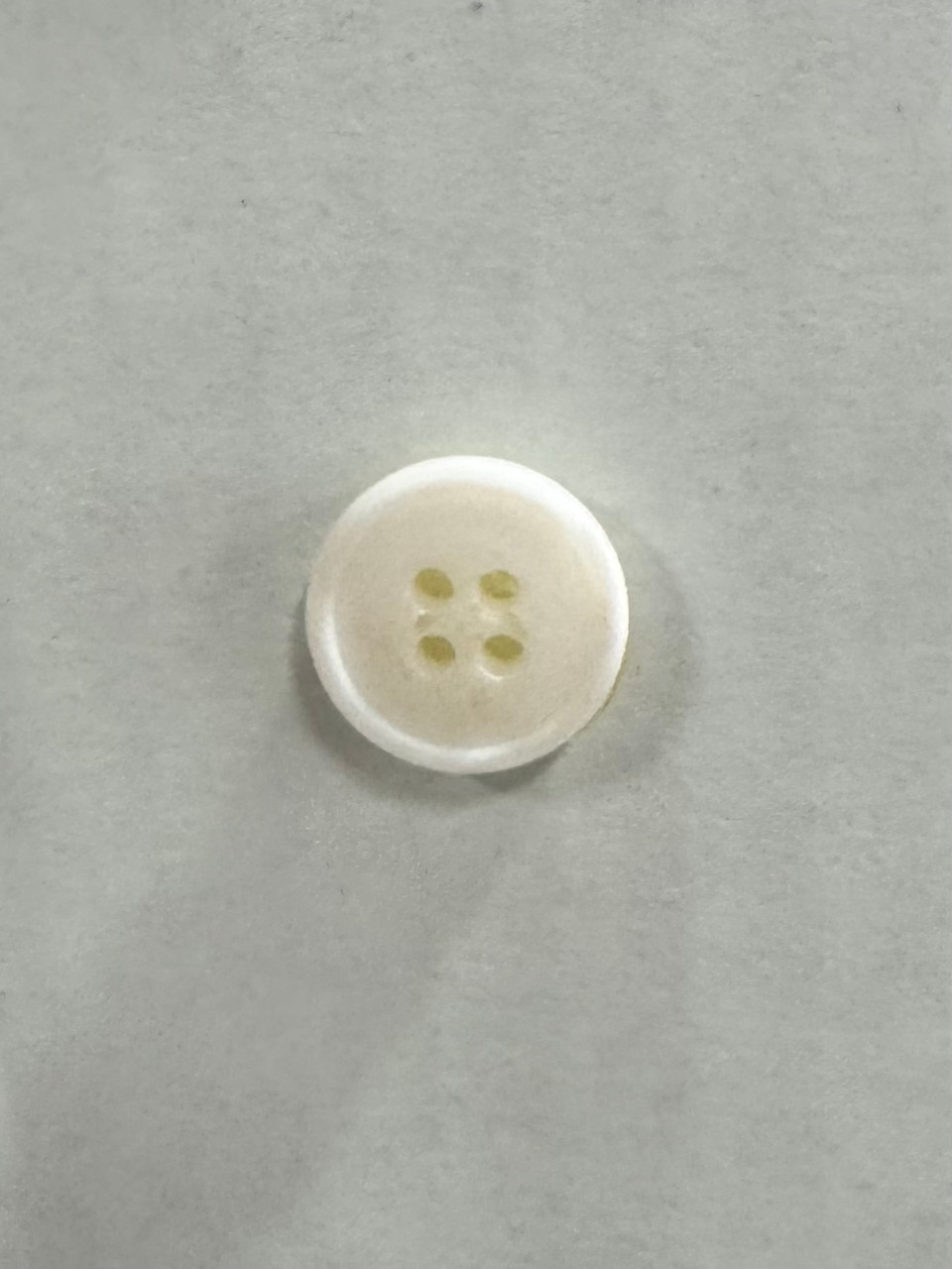 White Button (three sizes, $1, $2, $3) - Fishman's Fabrics