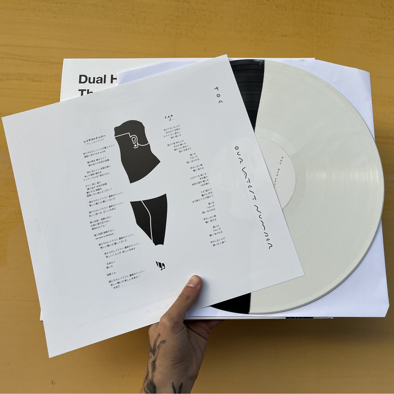 TOE - Our Latest Number 12" (Black & White vinyl)