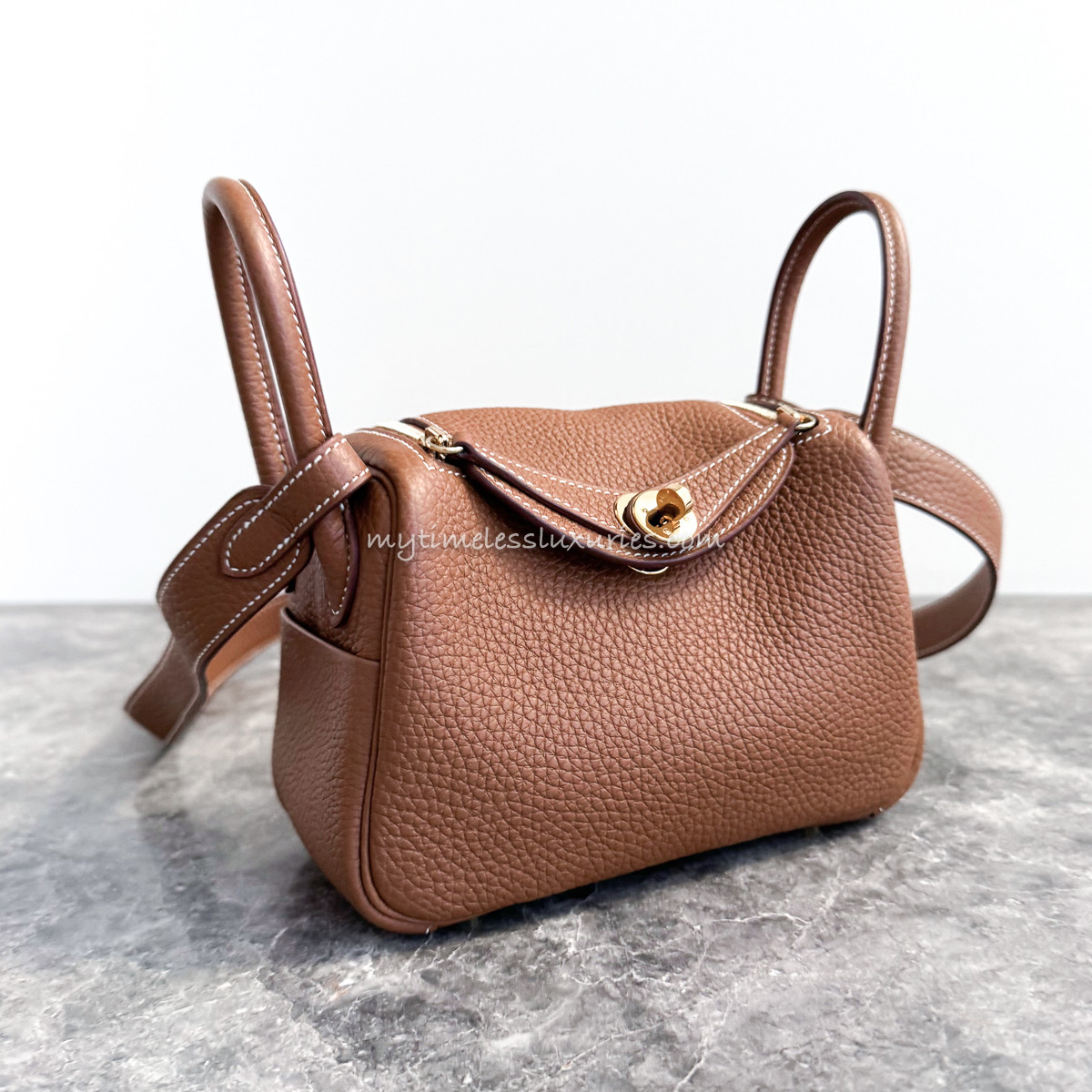 HERMES Mini Lindy Gold Clemence GHW U - Timeless Luxuries