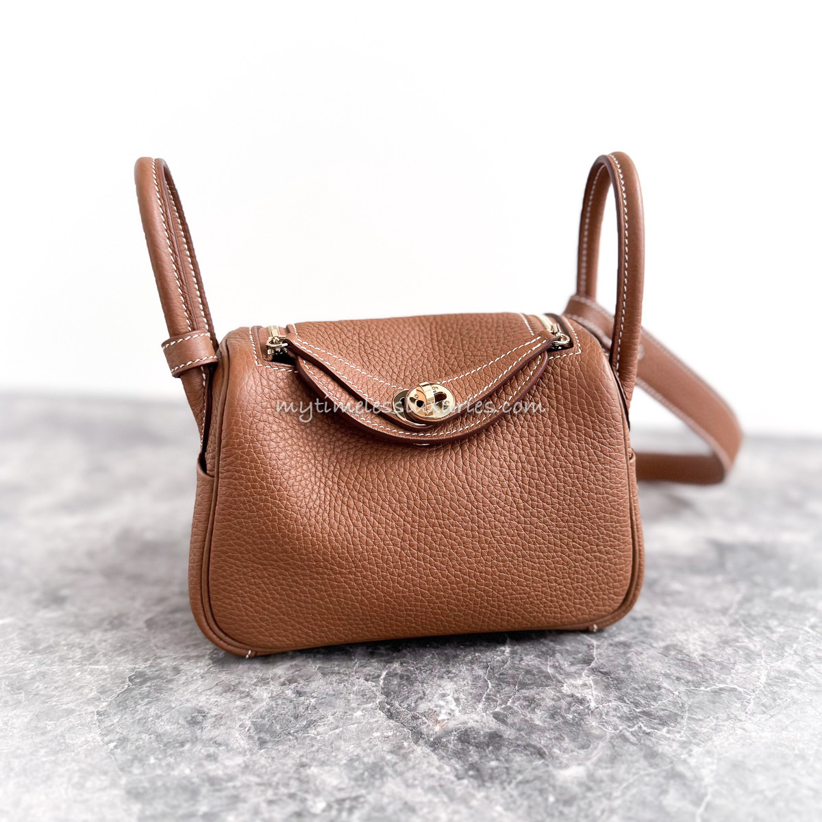 HERMES Mini Lindy Gold Clemence Gold Hw - Timeless Luxuries