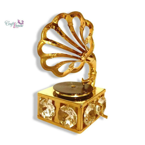Gold plated miniature gramaphone with crystal.vitage