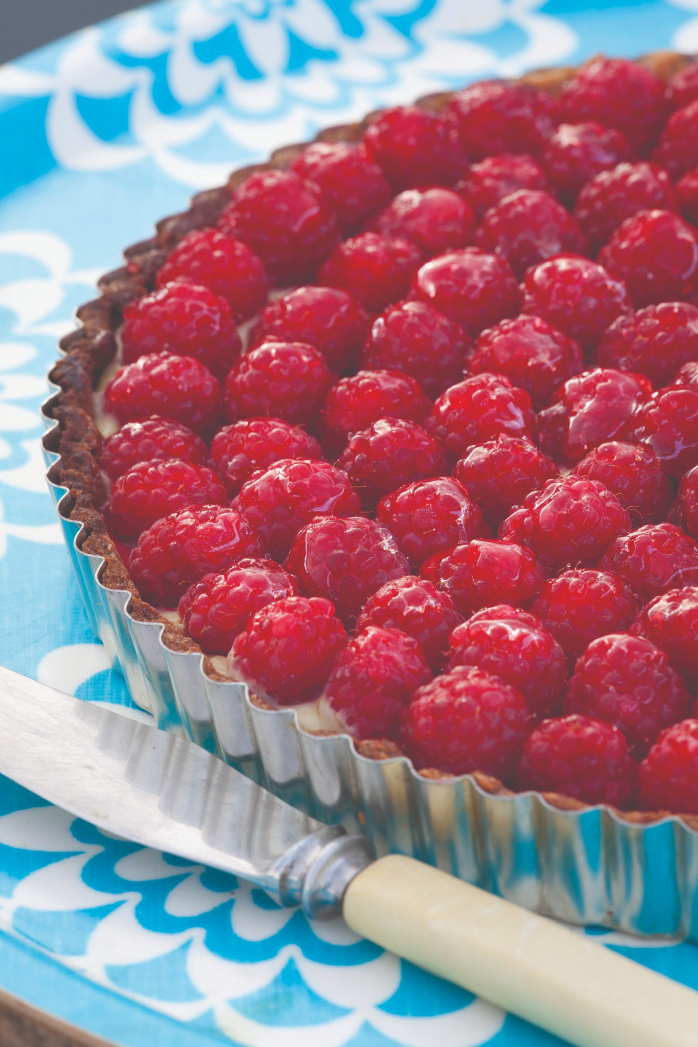 Lemon Tart Topped With Raspberries Recipe | Sarah Raven