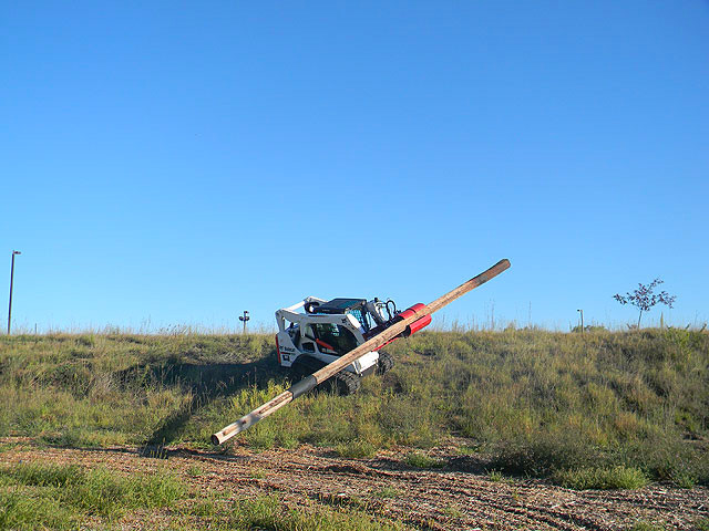 EZ Spot UR Skid Steer Pole Claw Attachment | Skid Steer Solutions