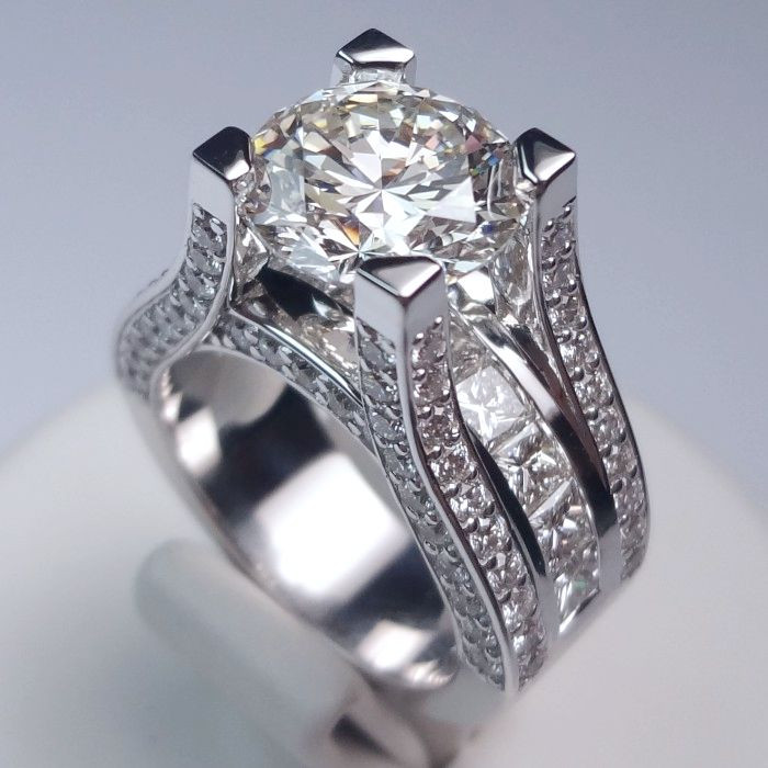 Floating Design Three Stone Engagement Ring with Half Moon Sides ...