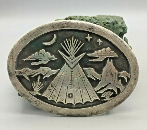 COLLECTIBLE! A Vintage Tommy Singer Belt Buckle