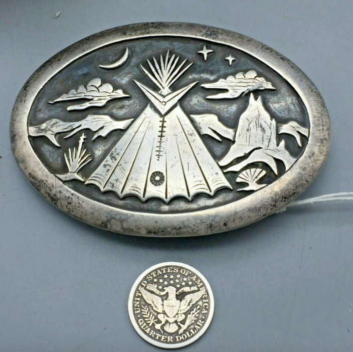 COLLECTIBLE! A Vintage Tommy Singer Belt Buckle