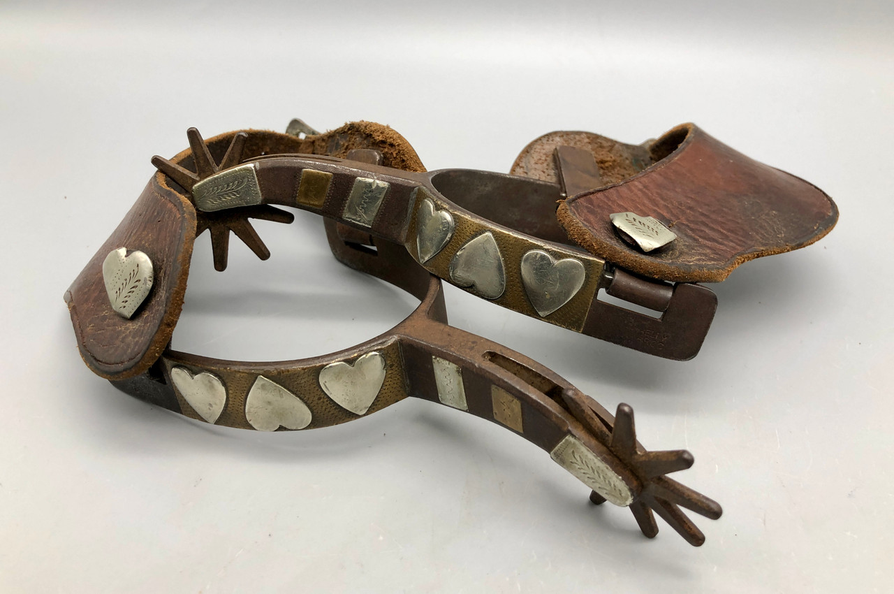 A Great Collectible Pair of Kelly Bros Heart Pattern Spurs