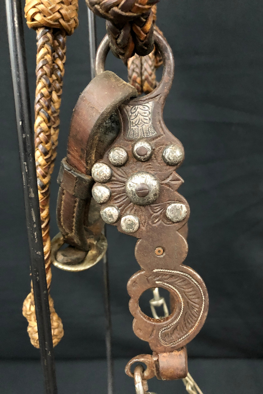 A Great Old Rawhide/Calfskin Braided Bridle with Kissing Bird Bit