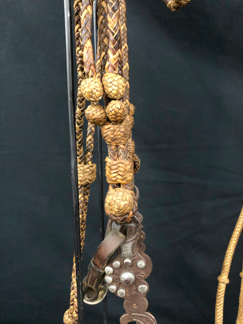 A Great Old Rawhide/Calfskin Braided Bridle with Kissing Bird Bit