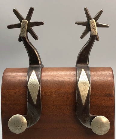An Great Old Collectable Pair of Kelly Bros Spurs With Diamond Pattern