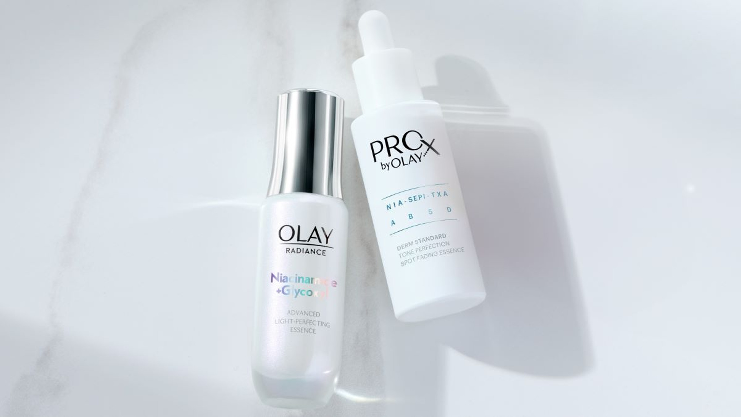 OLAY小白瓶比較：水感透白光曜精華 (抗糖精華) VS PROX 皙顔祛斑精華液 (防斑淡印精華) - OLAY HK